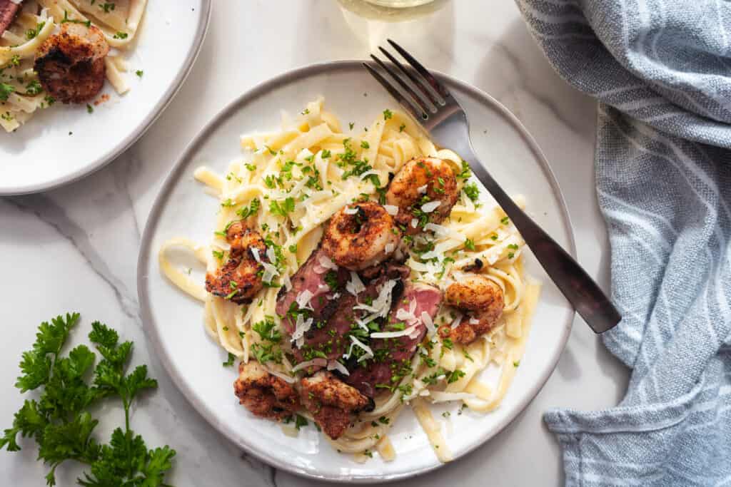 Steak and Cajun Shrimp Alfredo - Burnt Pellet BBQ